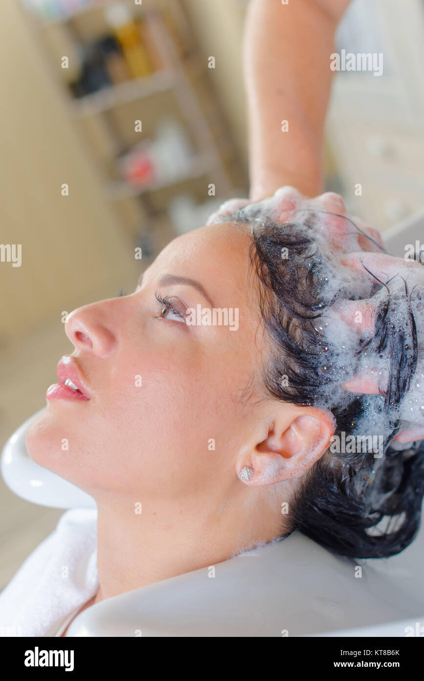 Woman lather shampoo hi-res stock photography and images - Alamy