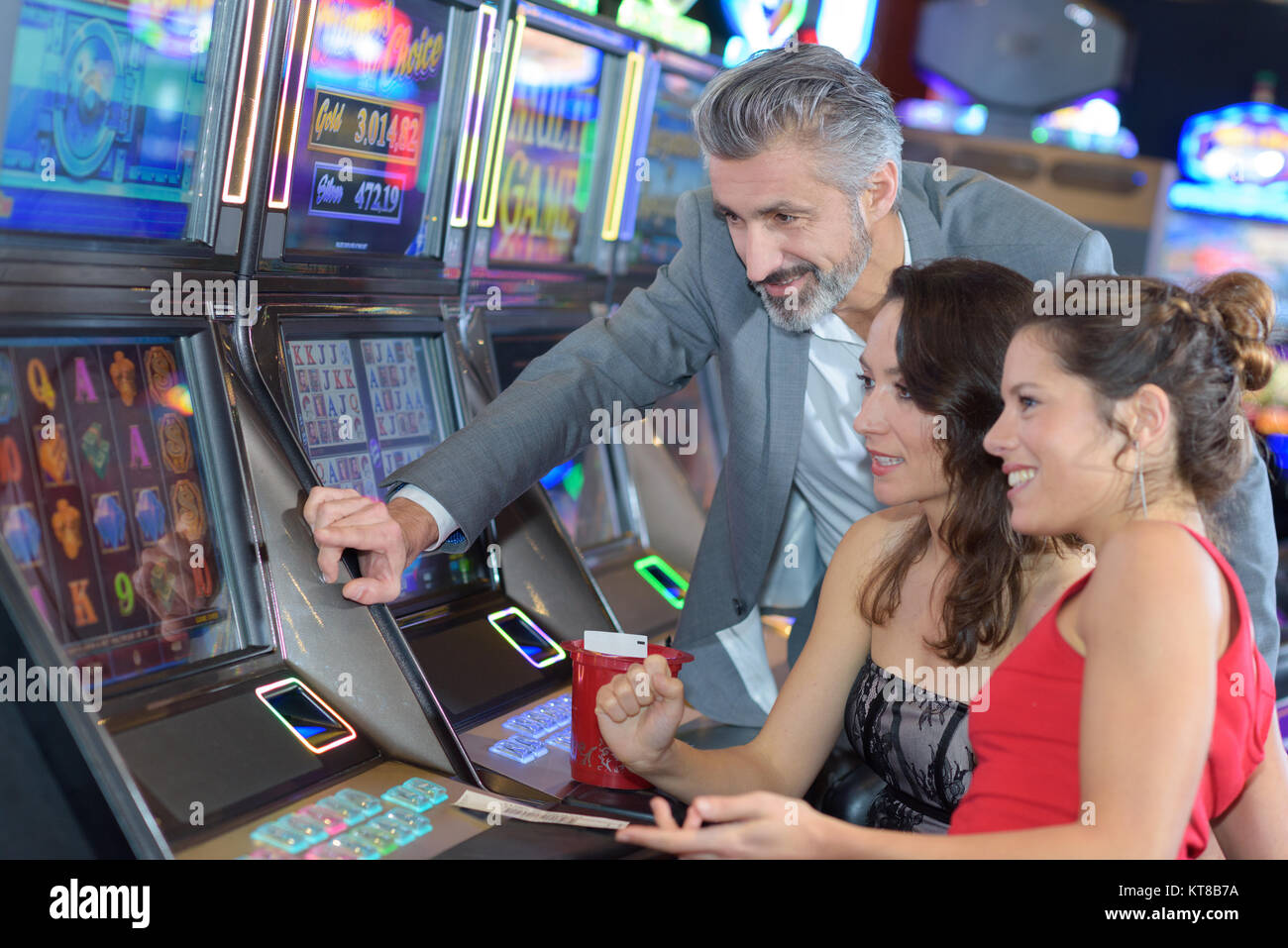 Young group people gambling in hi-res stock photography and images - Alamy