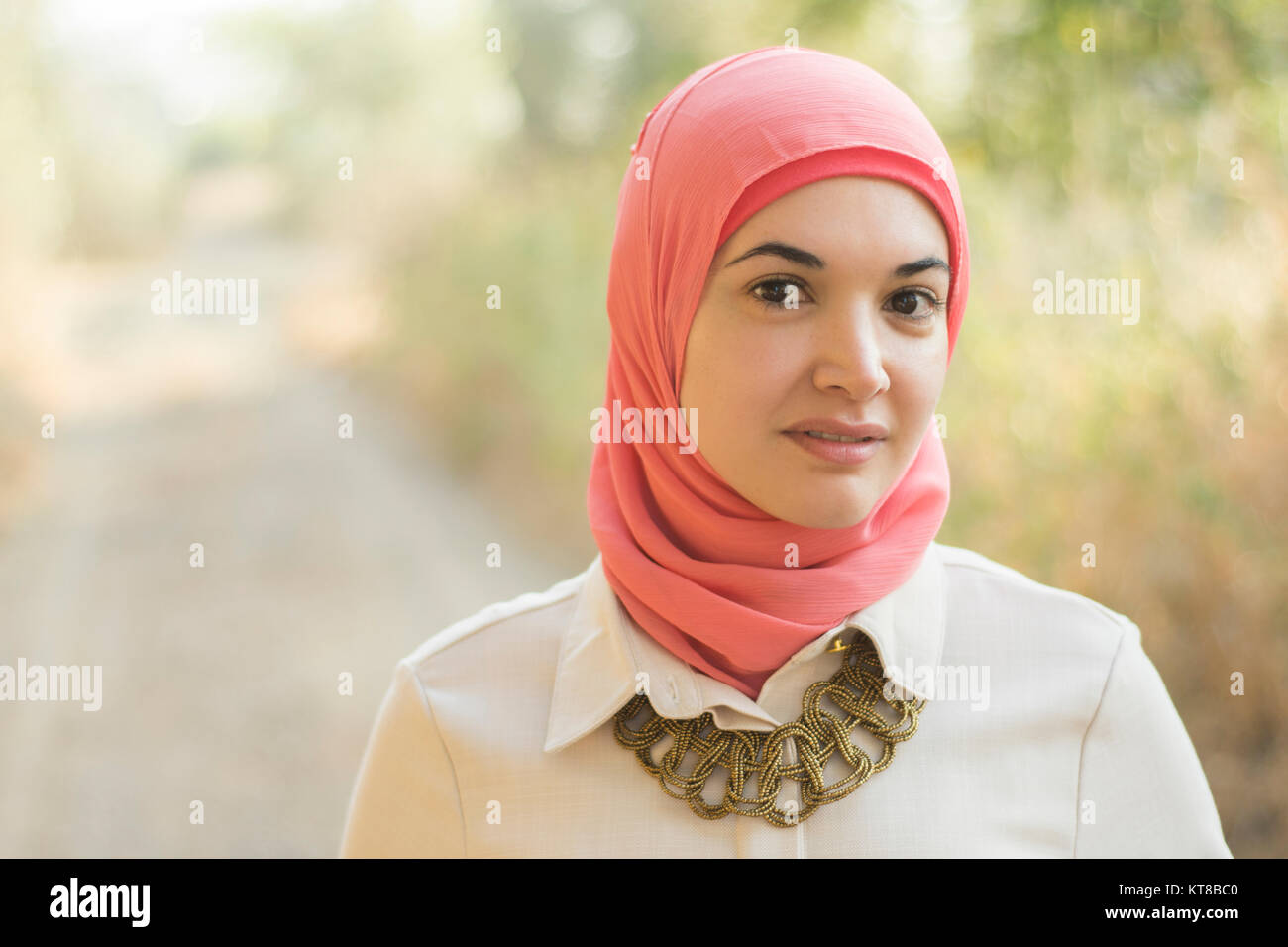 Beautiful Muslim woman standing outdoors Stock Photo - Alamy