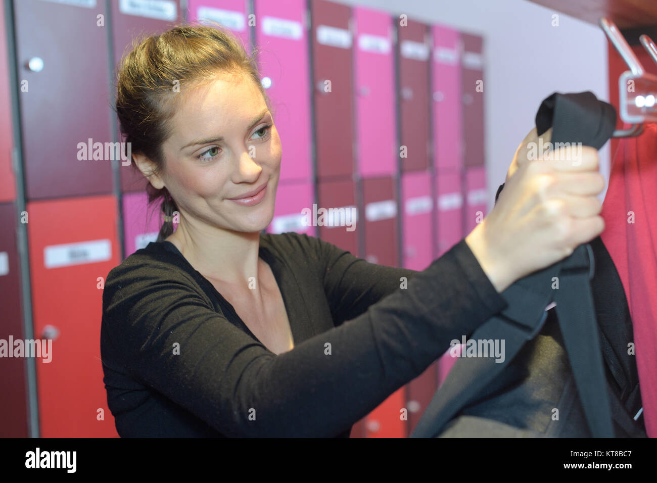 young woman is getting ready for fitness training Stock Photo - Alamy