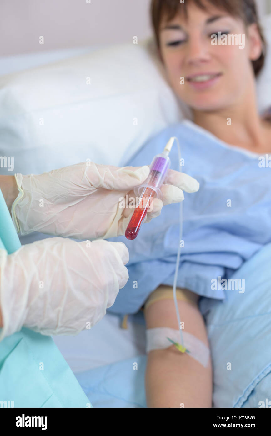 Patient having blood taken Stock Photo - Alamy