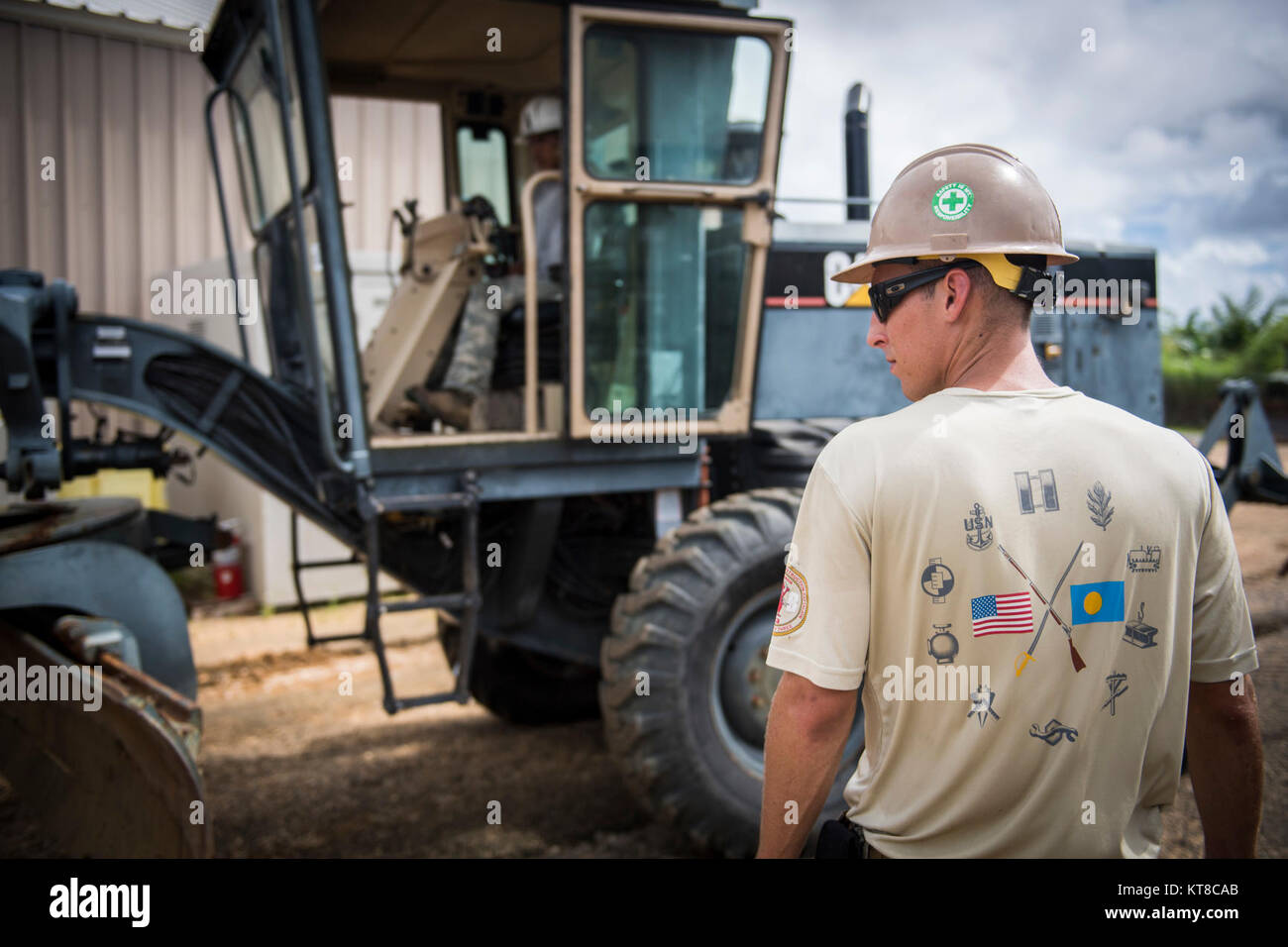 U.S. Navy Equipment Operator 3rd Class Jared Schapker, assigned to ...
