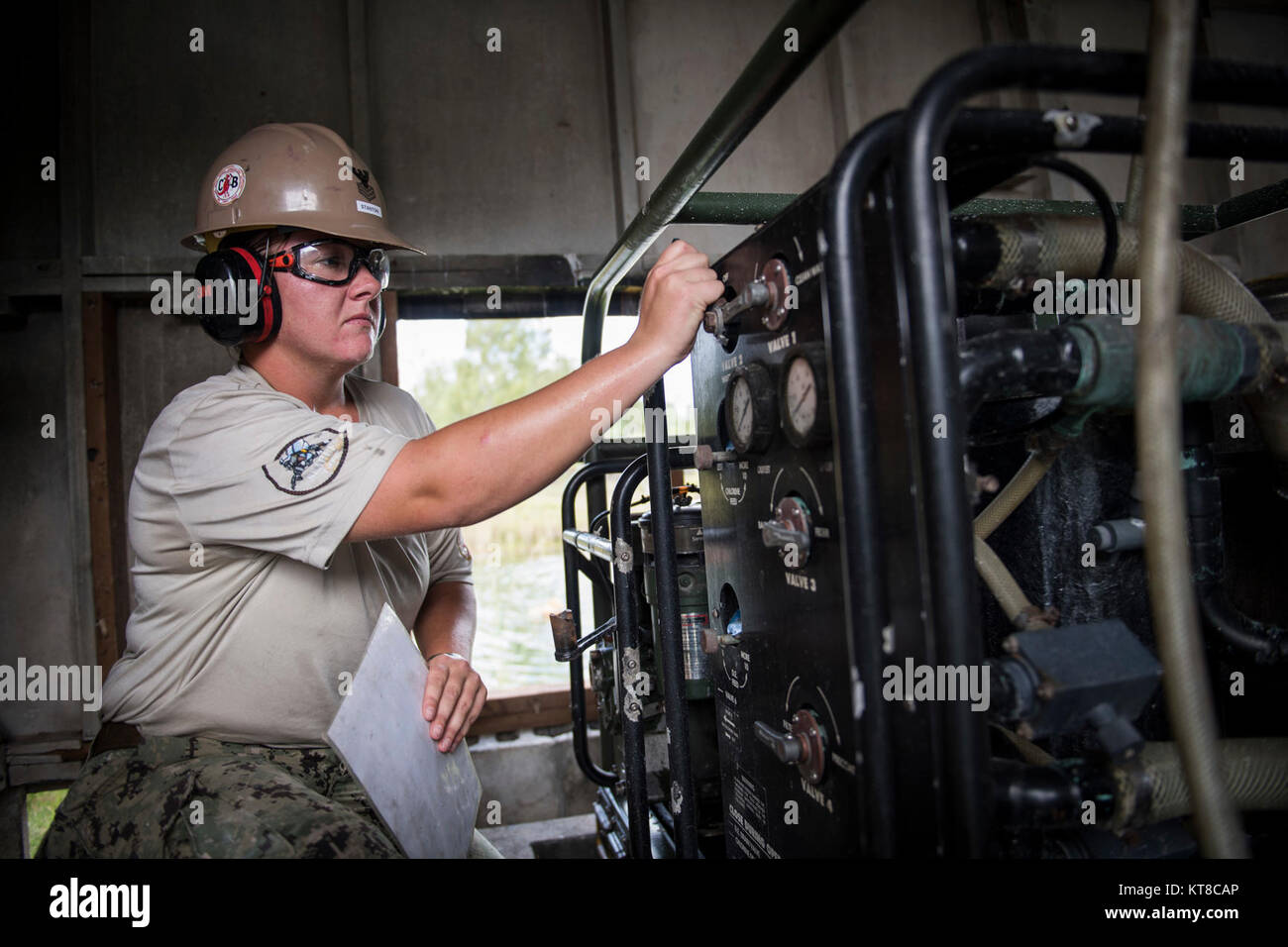 U.S. Navy Utilitiesman First Class Mariah Stanton, assigned to Naval ...