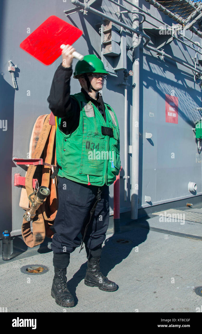 Seaman Alexis Posey, assigned to the amphibious assault ship USS Iwo ...