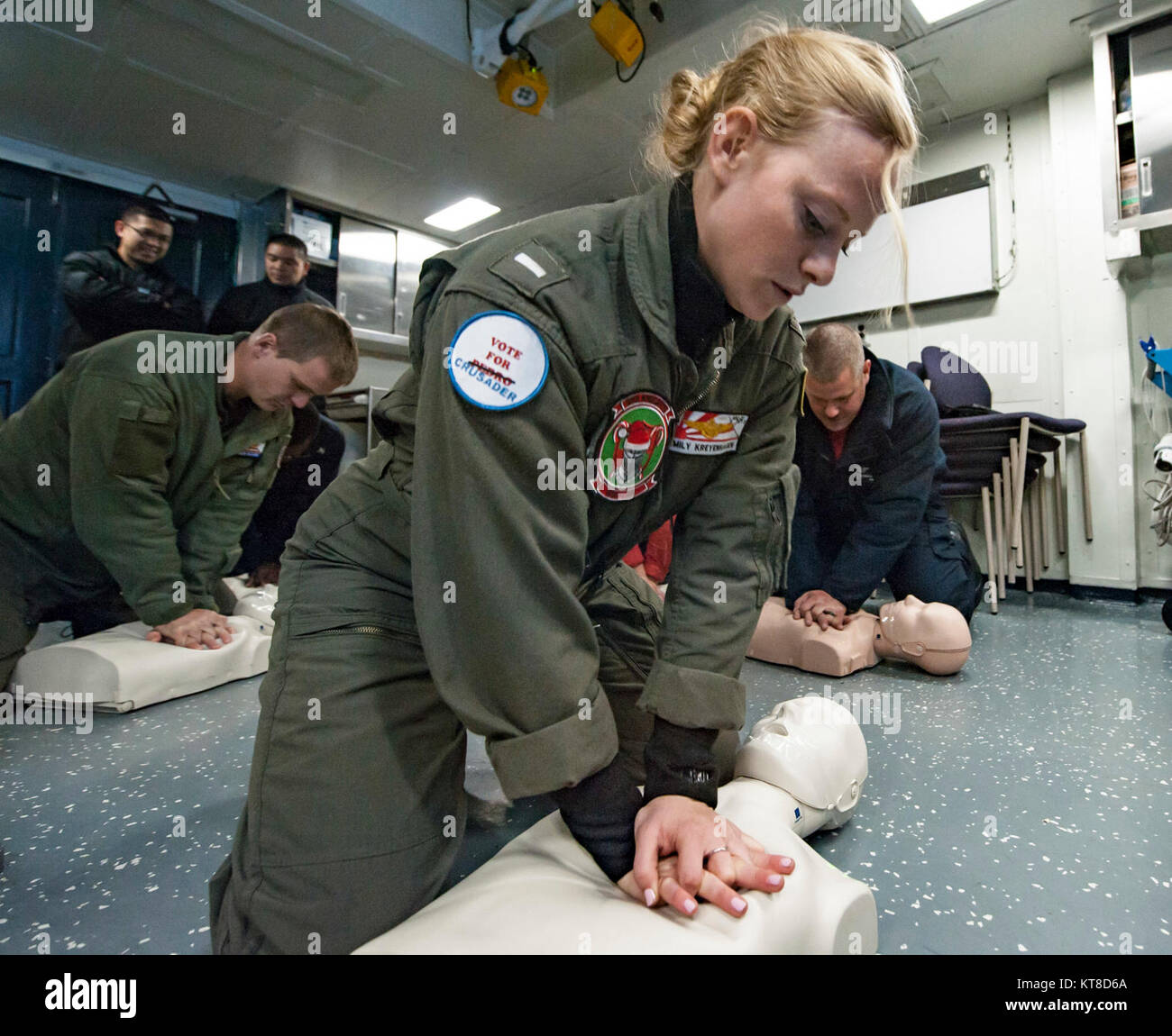Lt. j.g Emily Kreyenhagen practices chest compressions during CPR ...