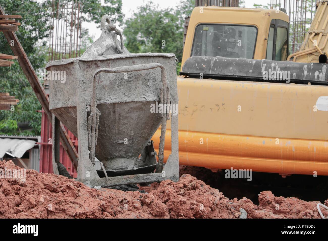 concrete bucket mixer container construction in building site workplace ...