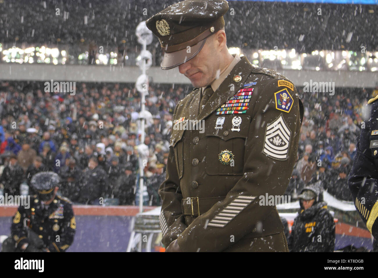 Sergeant Major of the Army Dan Dailey bows in prayer prior to kickoff at the Army-Navy game at ...