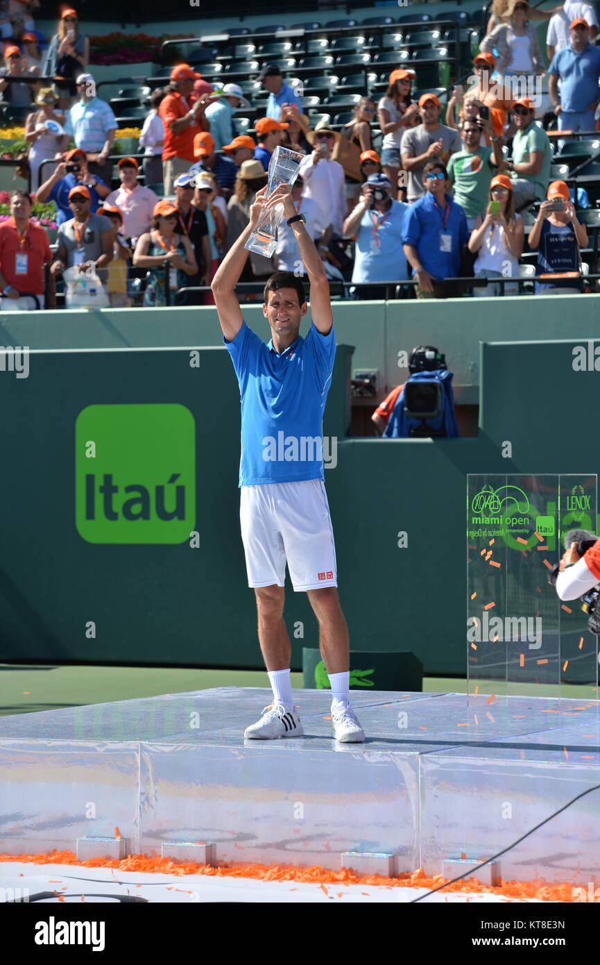 KEY BISCAYNE, FL - APRIL 05: Novak Djokovic of Serbia holds aloft the ...
