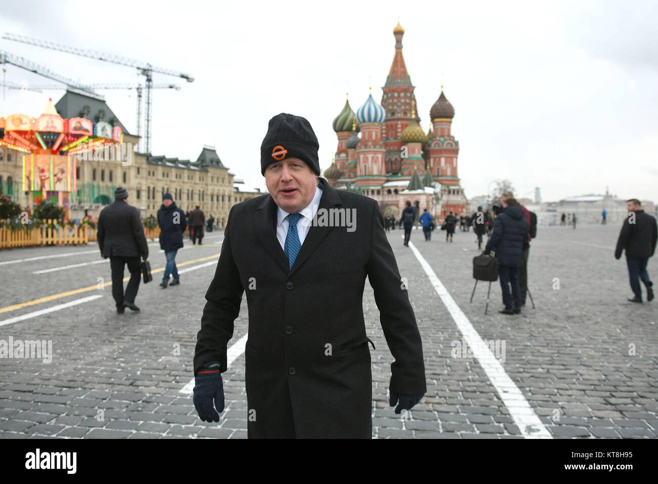 Foreign Secretary Boris Johnson stands in front of St Basil's Cathedral ...