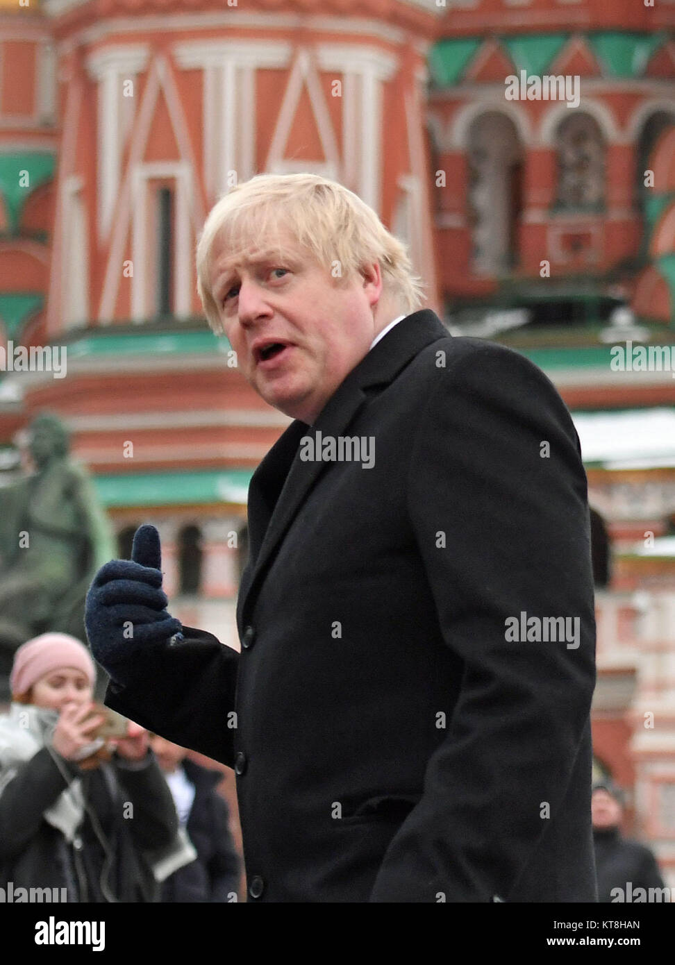 Foreign Secretary Boris Johnson stands in front of St Basil's Cathedral ...