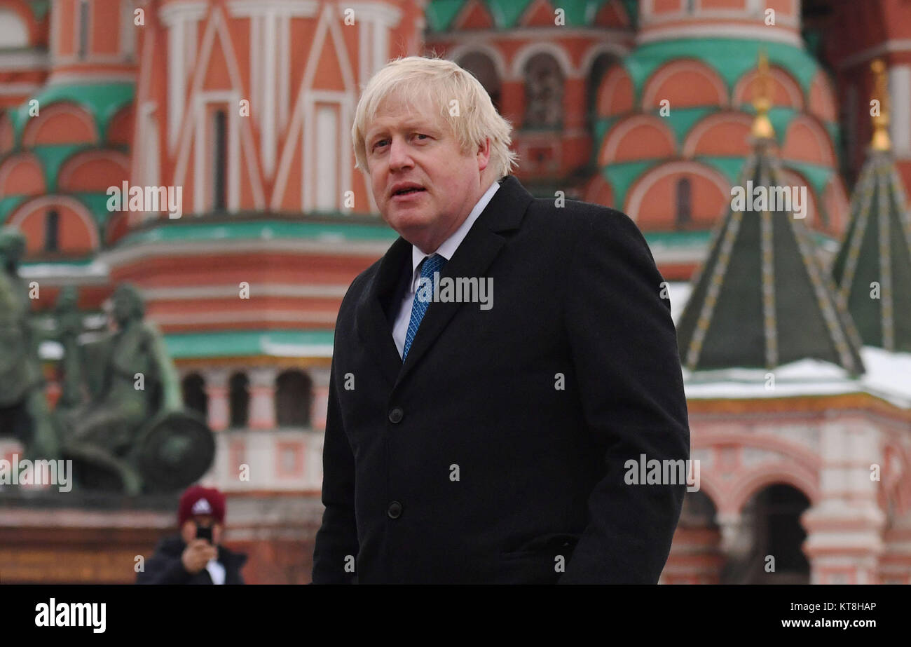 Foreign Secretary Boris Johnson stands in front of St Basil's Cathedral ...