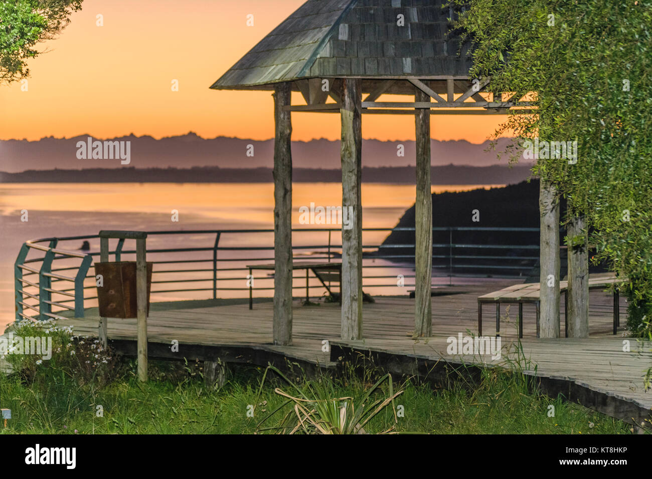 Sunset landscape scene from lake viewpoint at Chiloe island, Chile ...