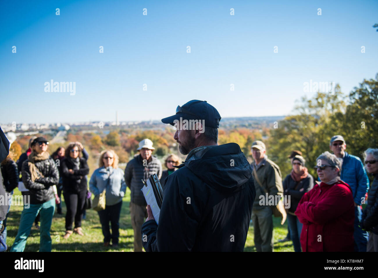 Greg Huse, urban forrester, Arlington National Cemetery, leads a tour ...