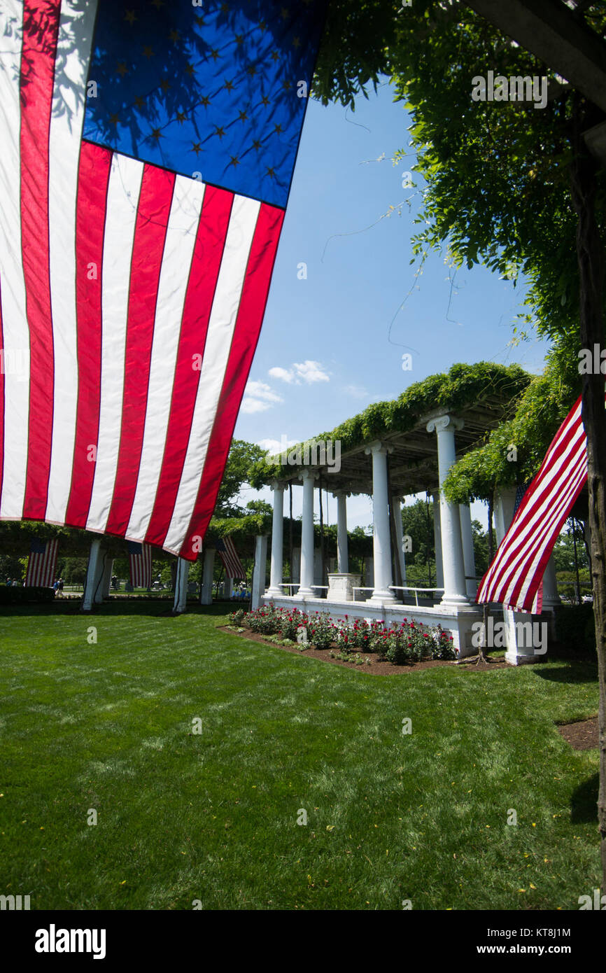 American flags hang in the Cpl. James R. Tanner Amphitheater in ...