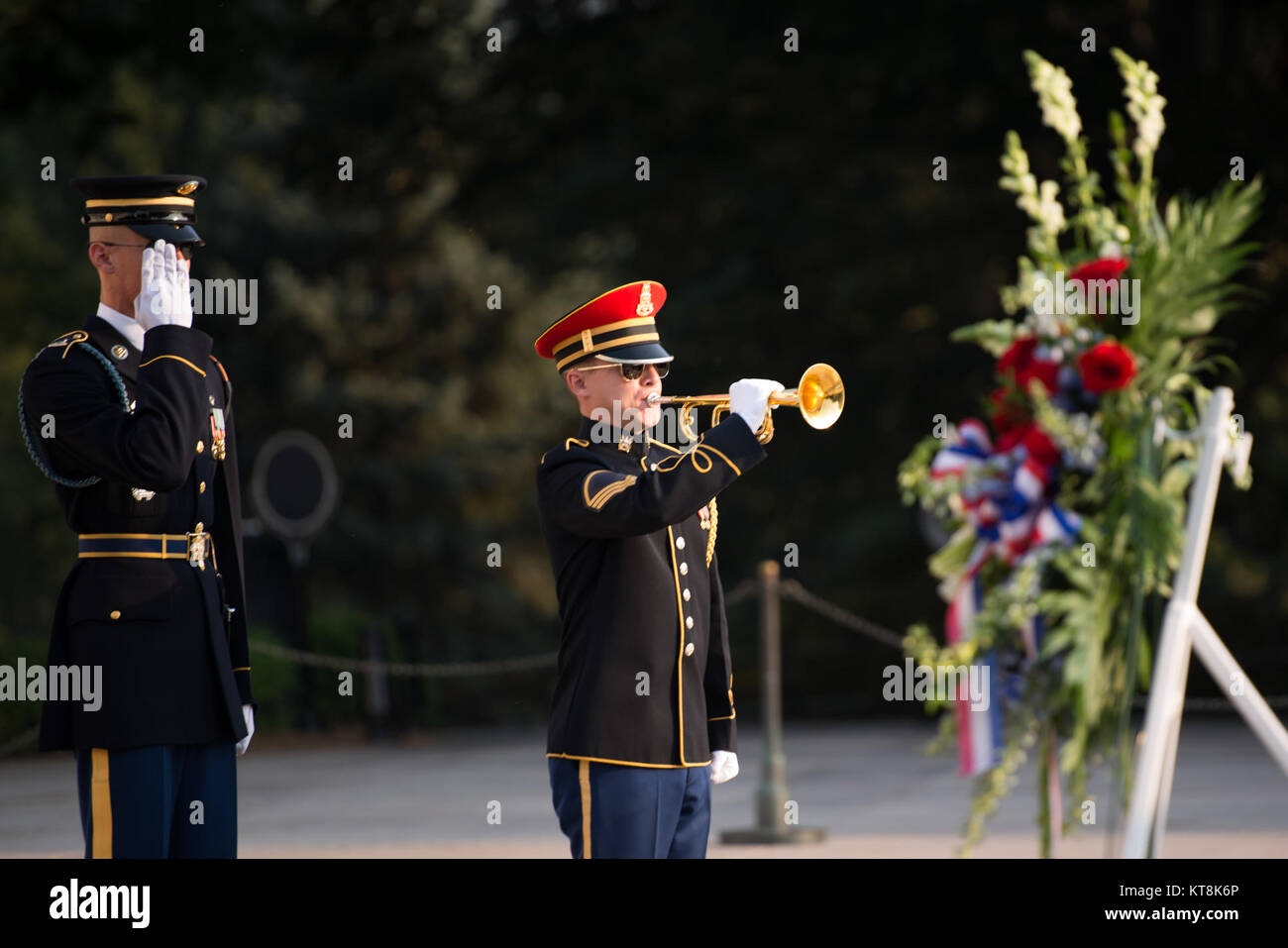 A bugler with The U.S. Army Band, “Pershing’s Own,” plays Taps during a ...
