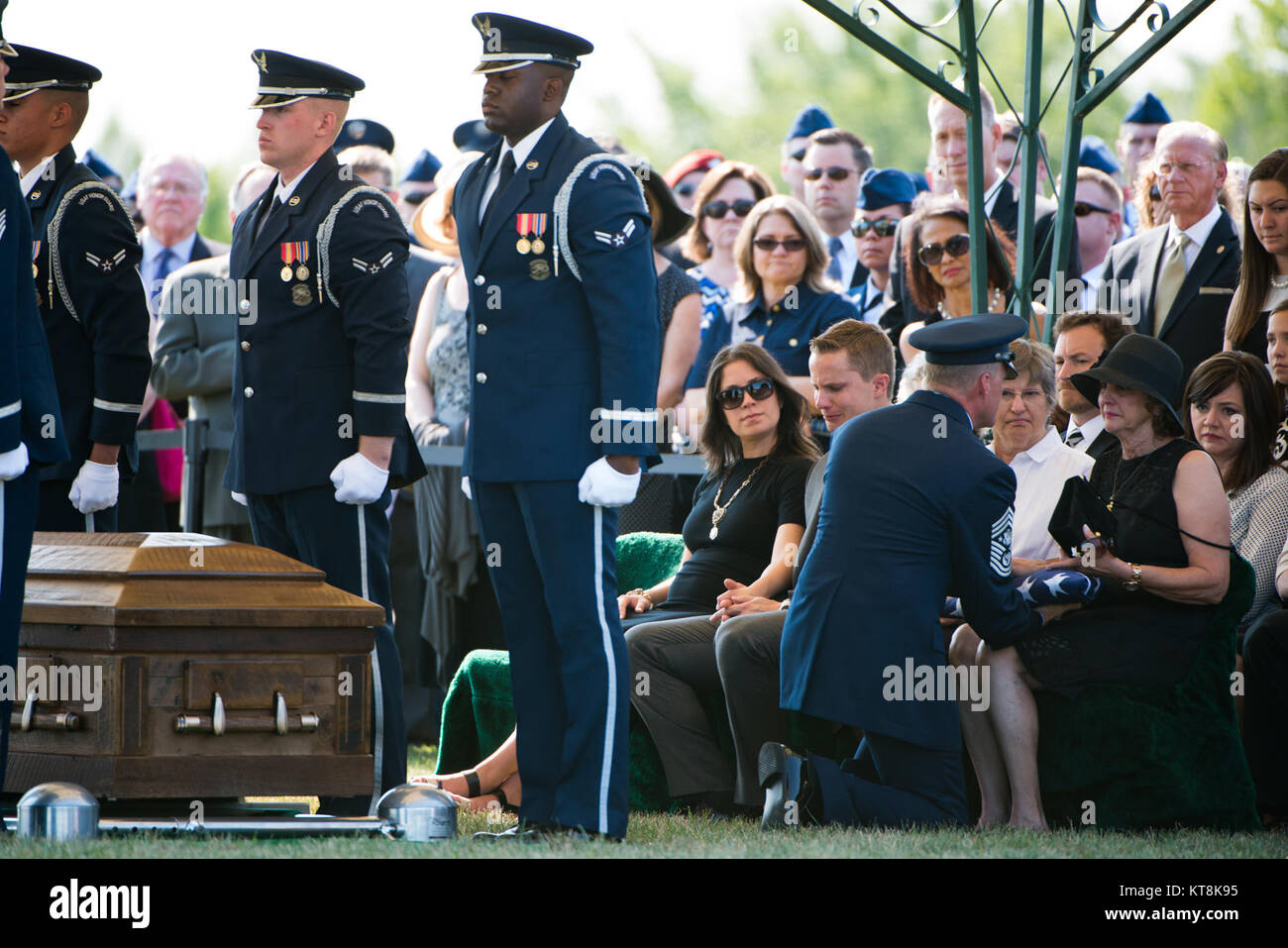 Janice Binnicker receives the American flag from Chief Master Sgt. of ...