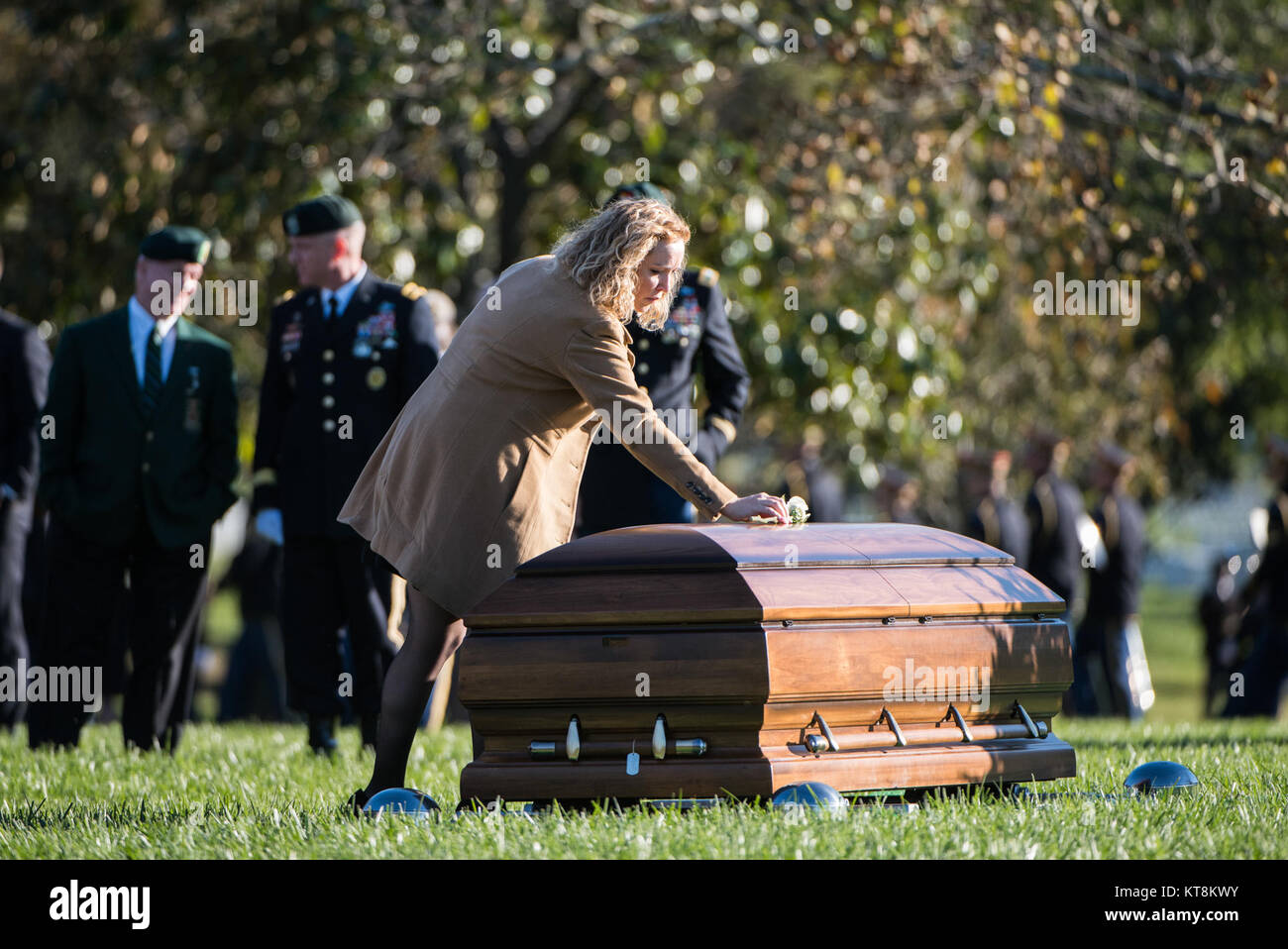 Michelle Black places a rose on her husband's, U.S. Army Staff Sgt ...