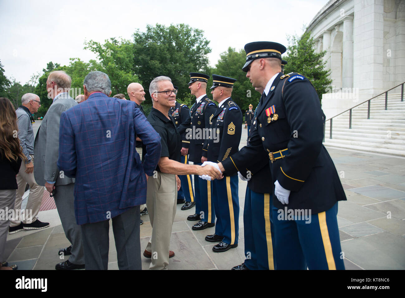 Members of the Atlanta Falcons front office lay a wreath at the Tomb of ...