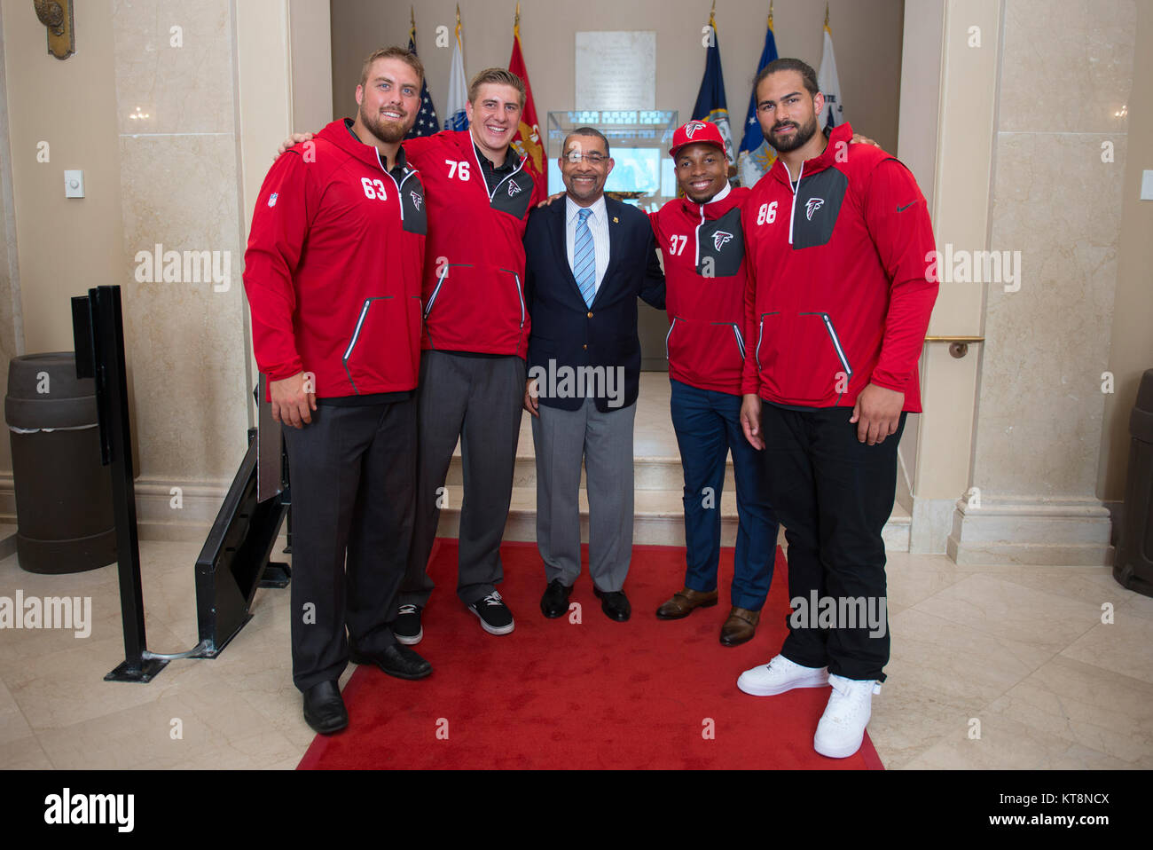 Members of the Atlanta Falcons front office lay a wreath at the Tomb of ...
