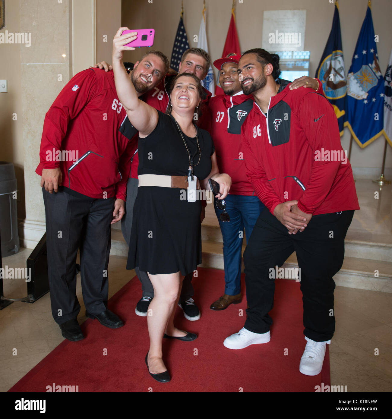 Members of the Atlanta Falcons front office lay a wreath at the Tomb of ...