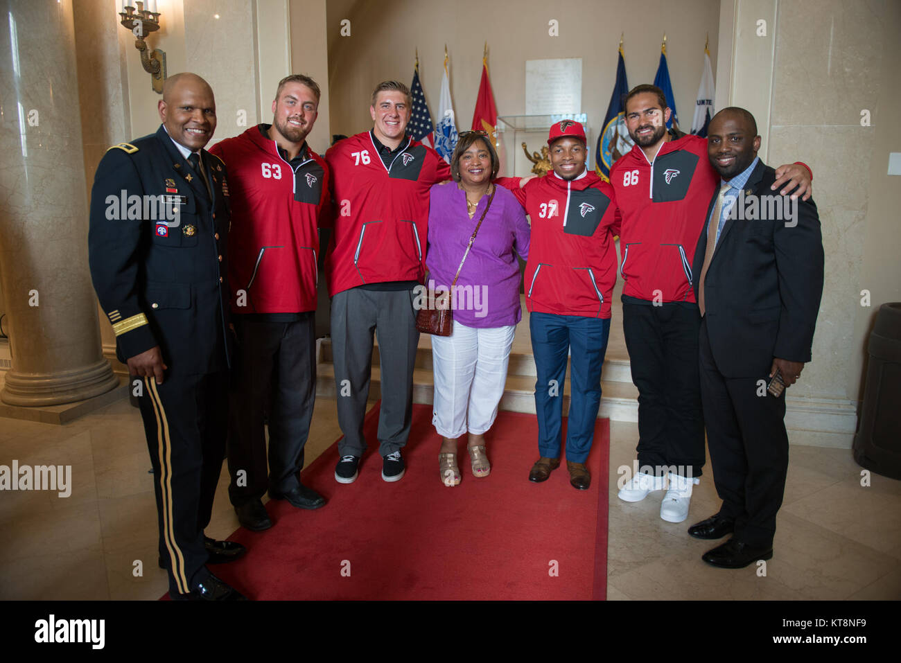 Members of the Atlanta Falcons front office lay a wreath at the Tomb of ...