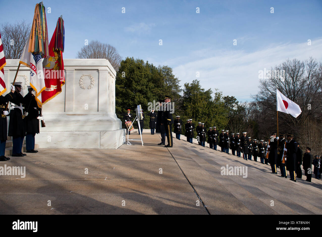 Shinzo Abe, center-left, prime minster of Japan, is escorted by Maj ...