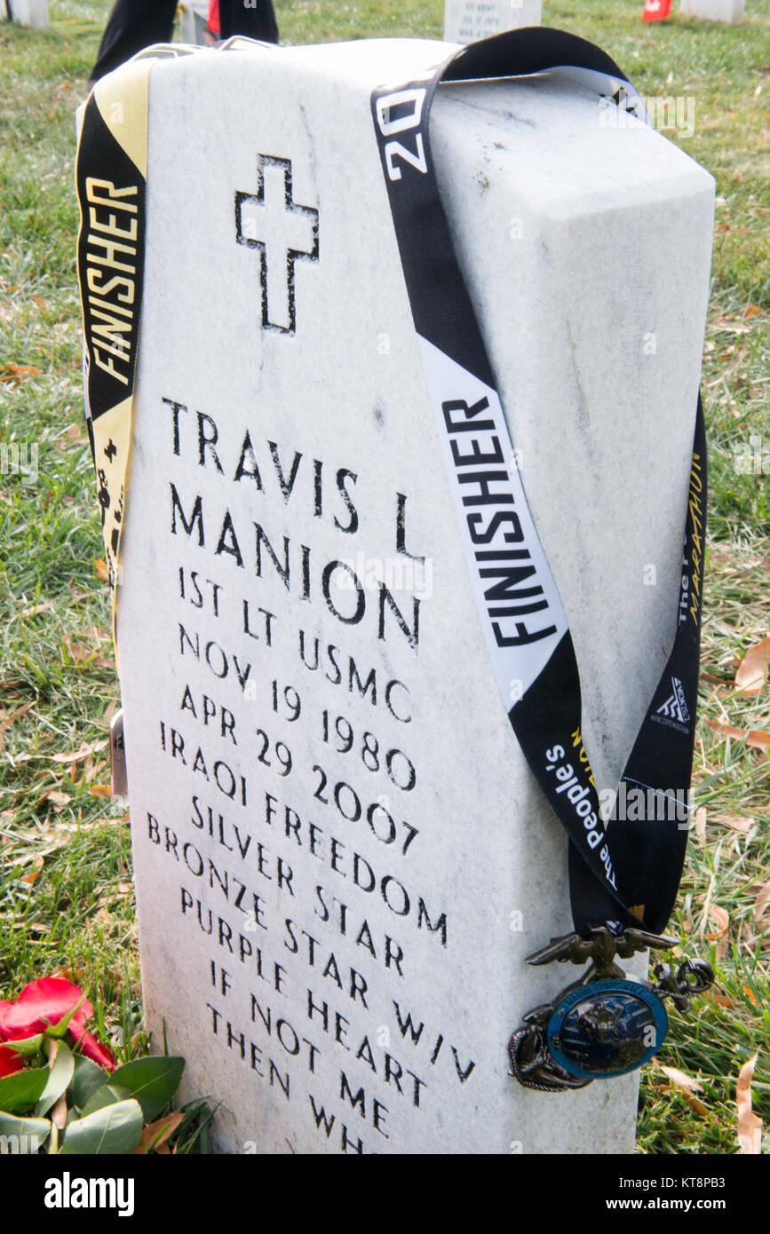 The grave of U.S. Marine Corps 1st Lt. Travis Manion is decorated with ...