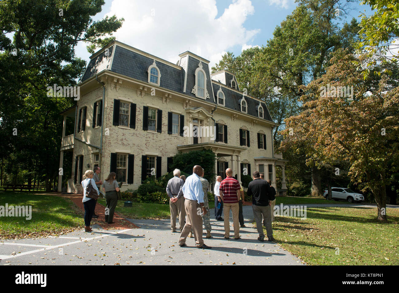 Arlington National Cemetery employees receive a tour the Gambrill House ...
