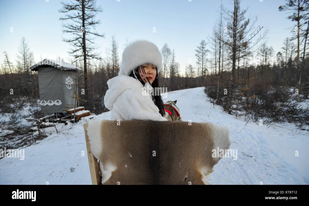 Genhe, China's Inner Mongolia Autonomous Region. 20th Dec, 2017. A girl ...