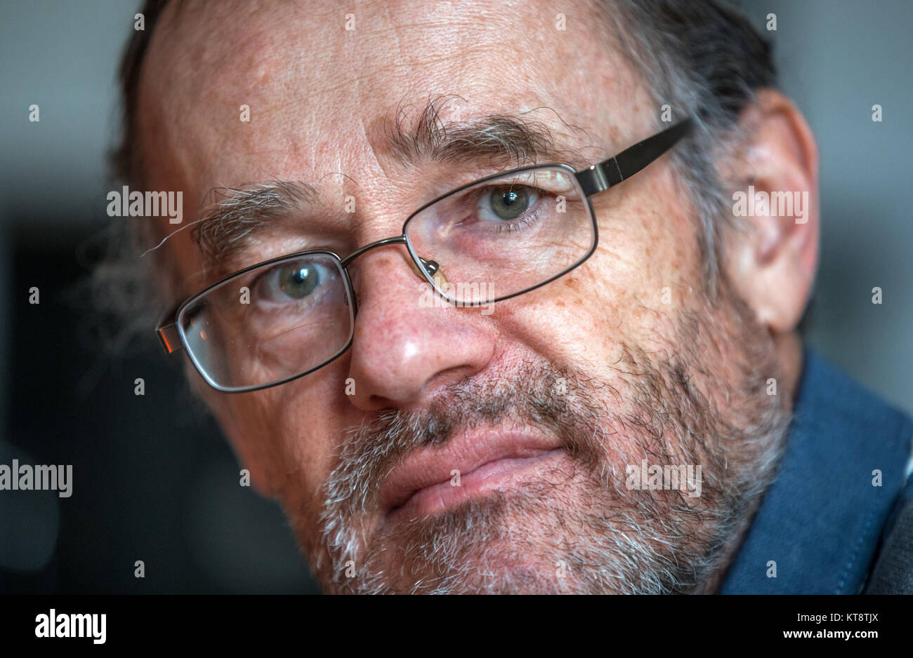 David Britsch, a pilgrim, talks to a reporter during an interview in ...