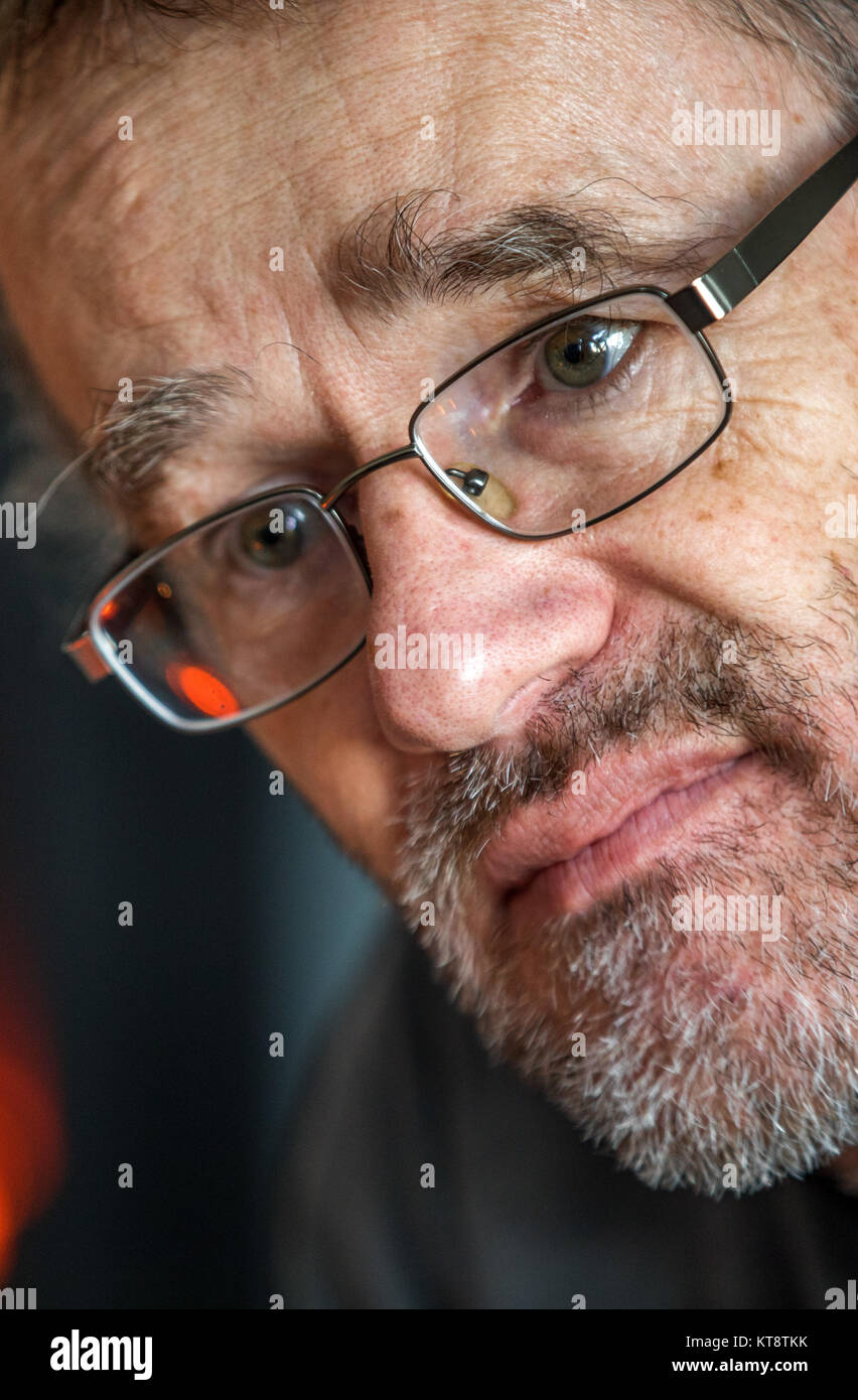 David Britsch, a pilgrim, talks to a reporter during an interview in ...