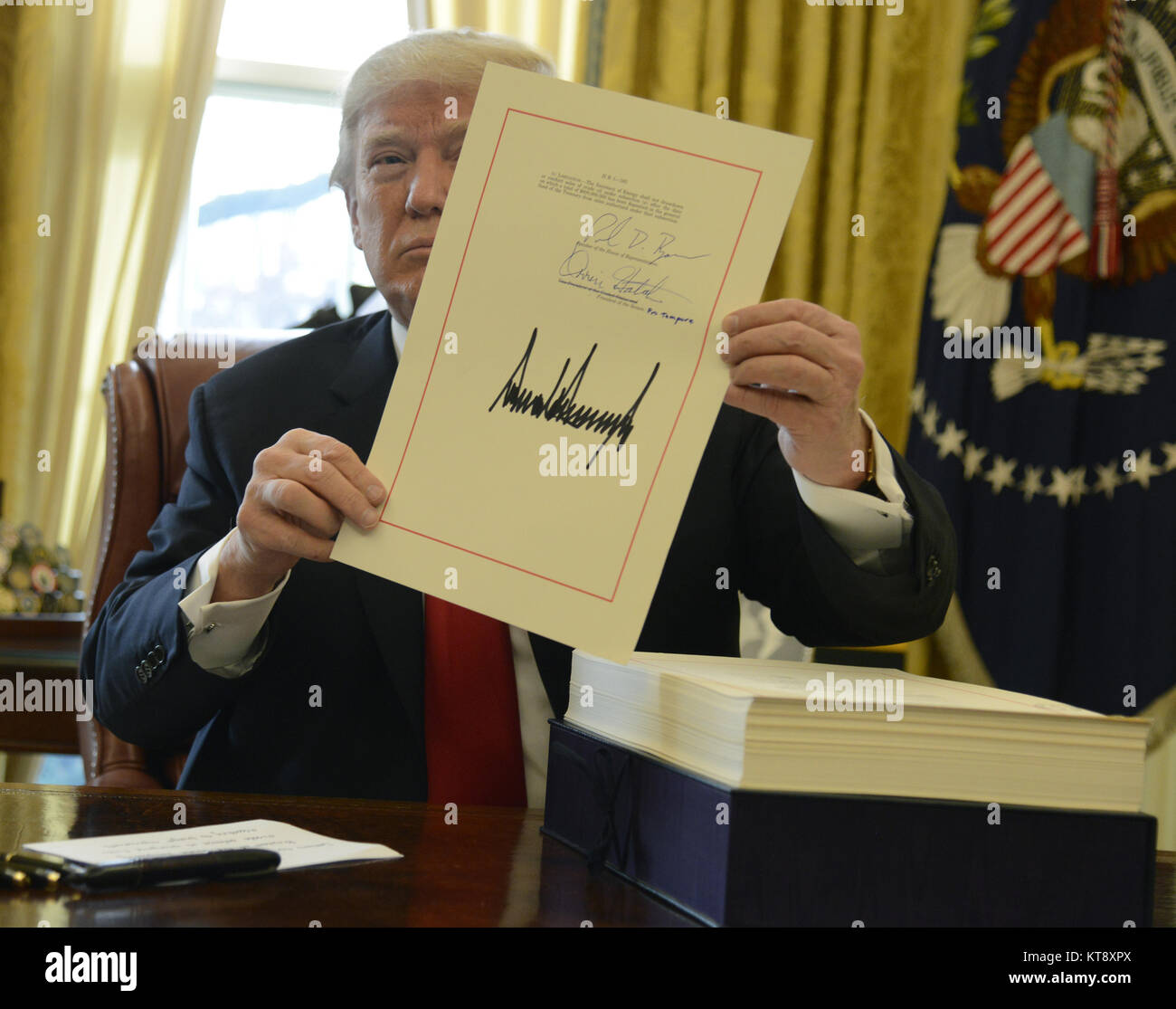 Donald trump signing tax bill hi-res stock photography and images - Alamy