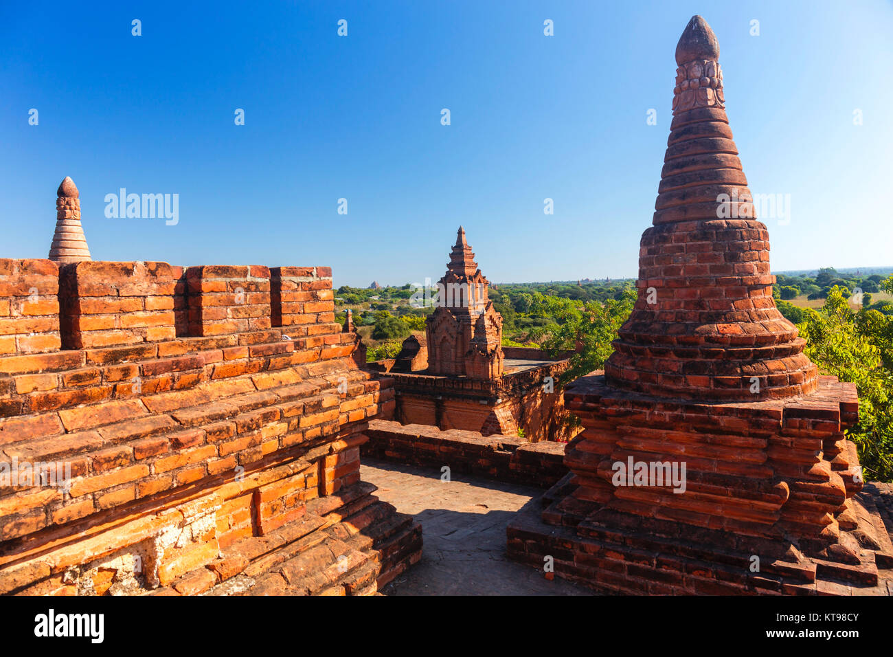 Bagan buddha tower at day Stock Photo - Alamy