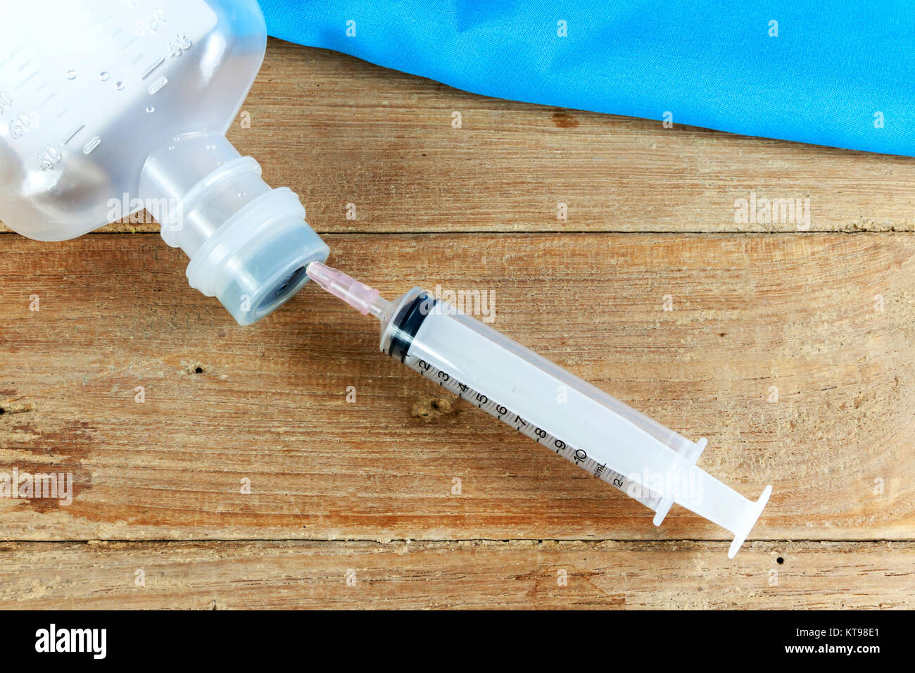 saline solution and injection needle Stock Photo - Alamy