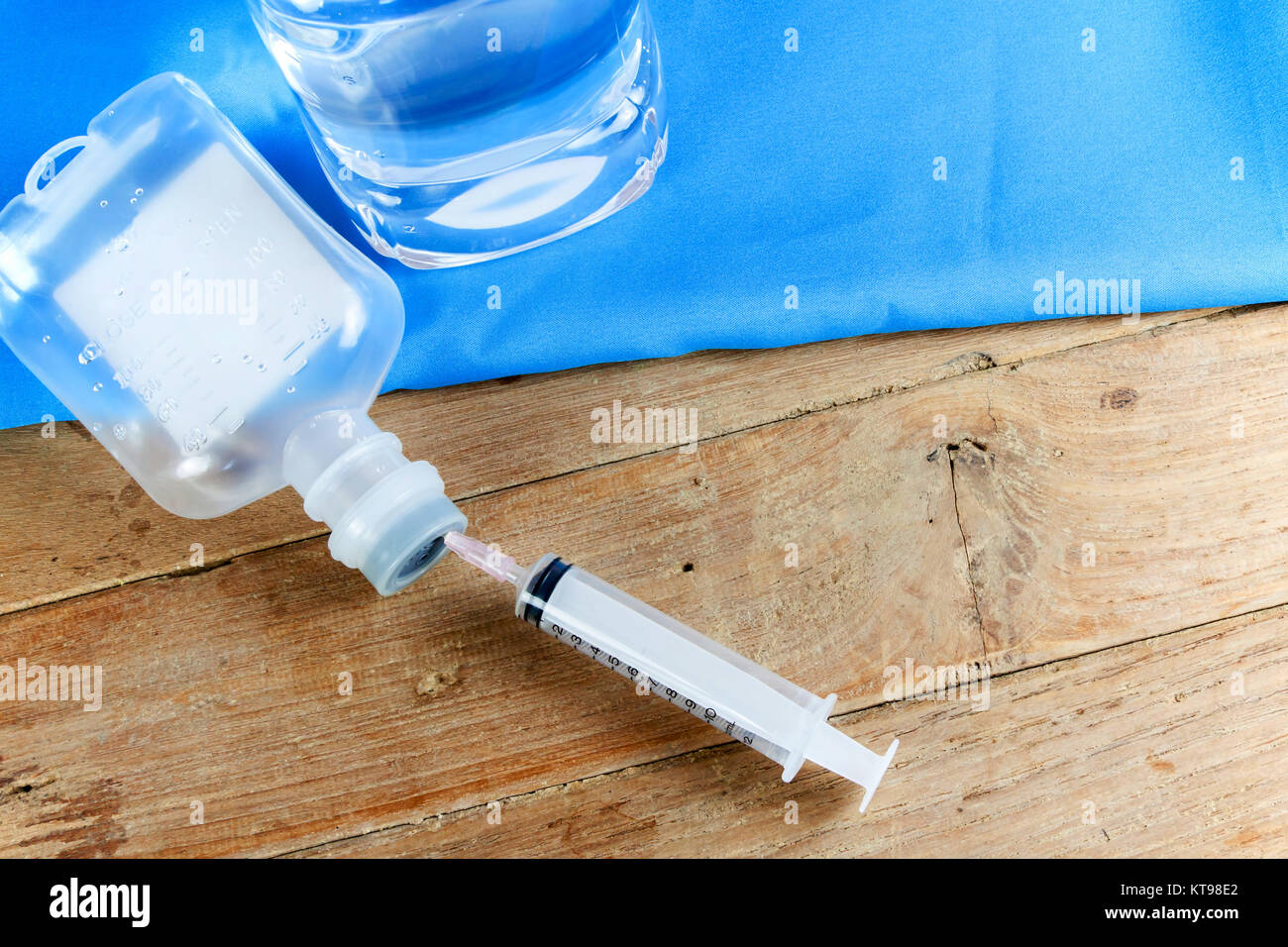 saline solution and injection needle Stock Photo - Alamy