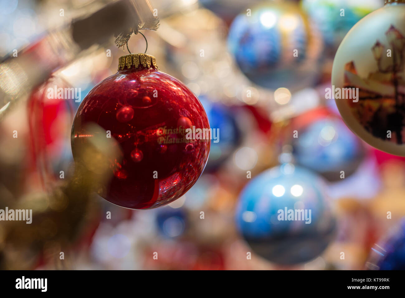 Red bauble hanging at a stand on a Christmas market close up Stock ...