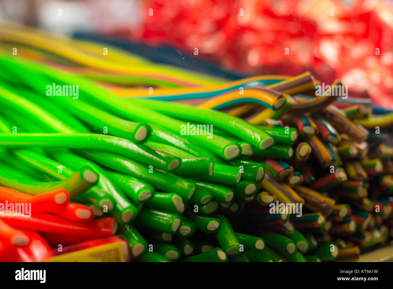 Different colored sweets at a Christmas market close up Stock Photo - Alamy