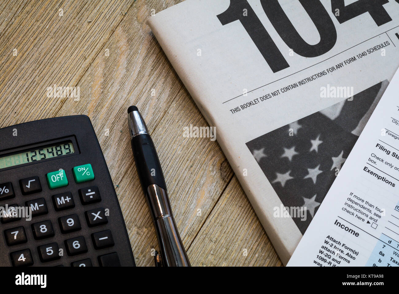 Tax preparation forms and tax booklet US 1040 Tax form Stock Photo - Alamy