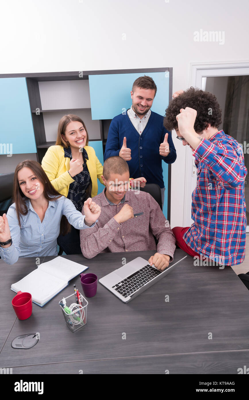 Portrait of startup group of creative people having a meeting with a ...