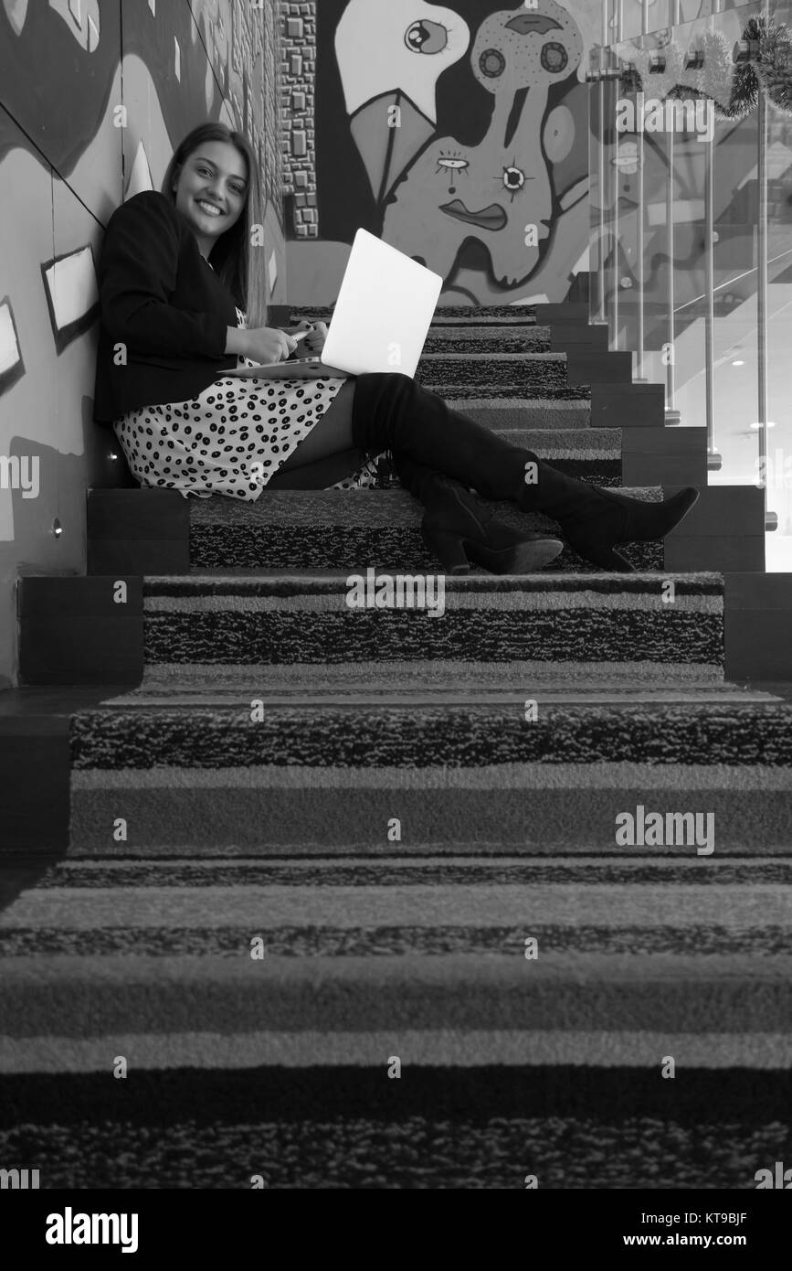 Laptop discussing Black and White Stock Photos & Images - Alamy