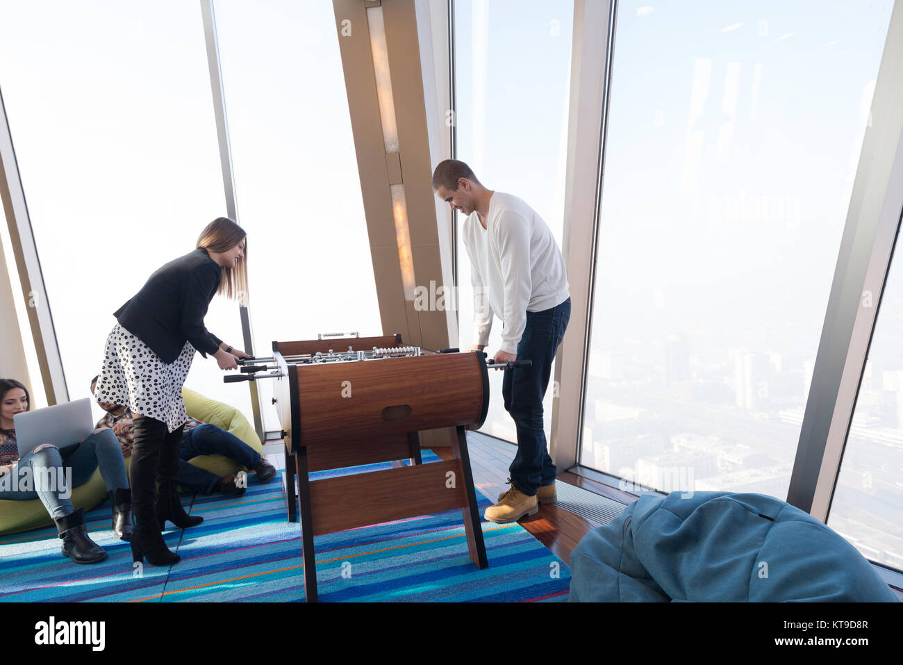 Group of young adults coworking together Stock Photo - Alamy