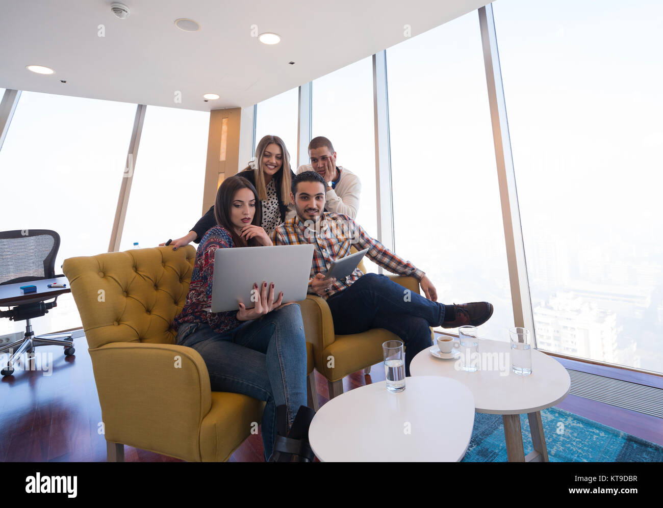 Group of adults resting after work Stock Photo - Alamy