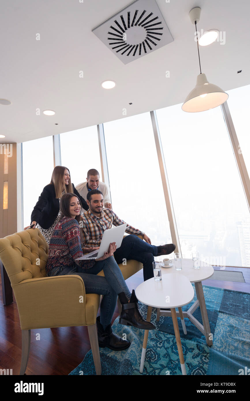 Group of adults resting after work Stock Photo - Alamy