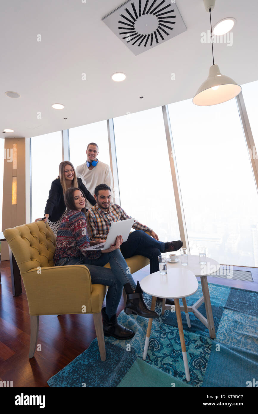 Group of adults resting after work Stock Photo - Alamy