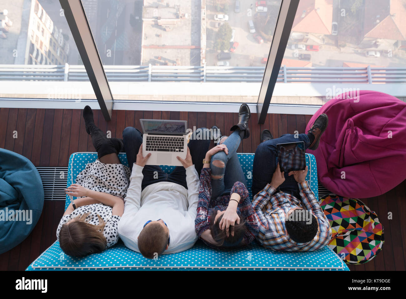 Group of young adults working Stock Photo - Alamy