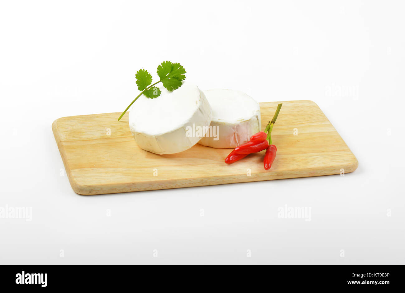 Wheels of soft white cheese Stock Photo - Alamy