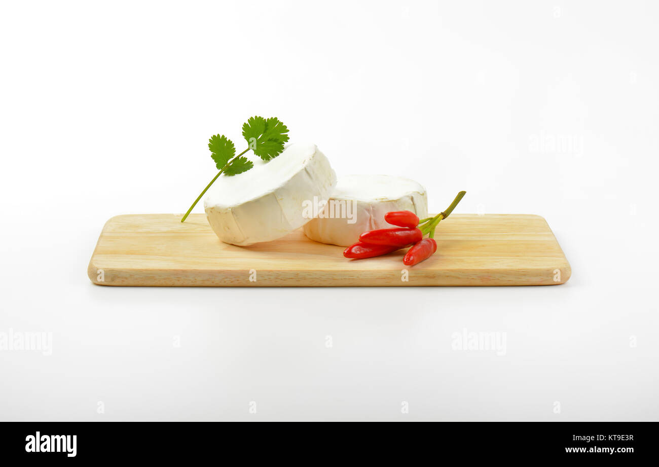 Wheels of soft white cheese Stock Photo - Alamy