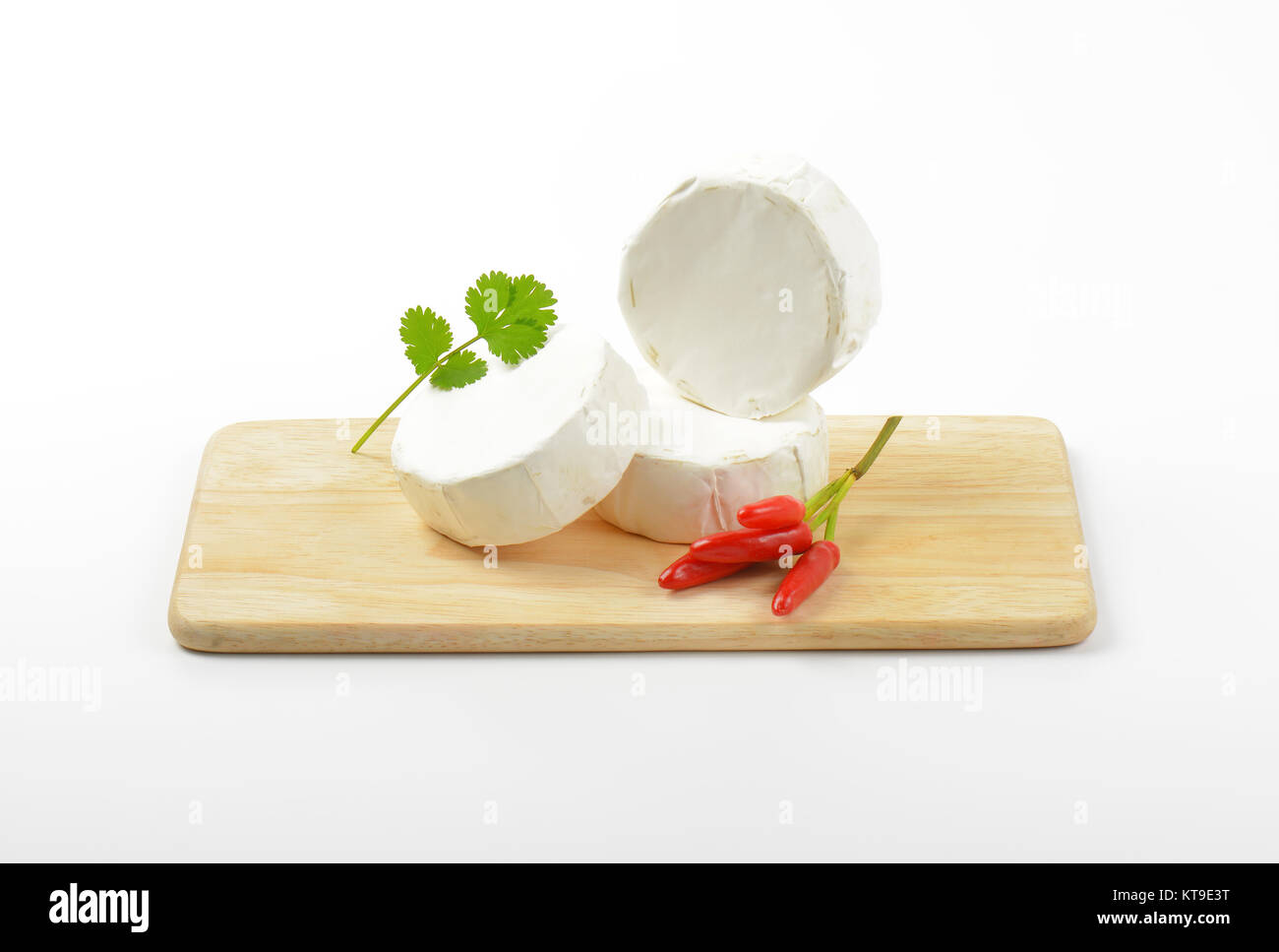 Wheels of soft white cheese Stock Photo - Alamy