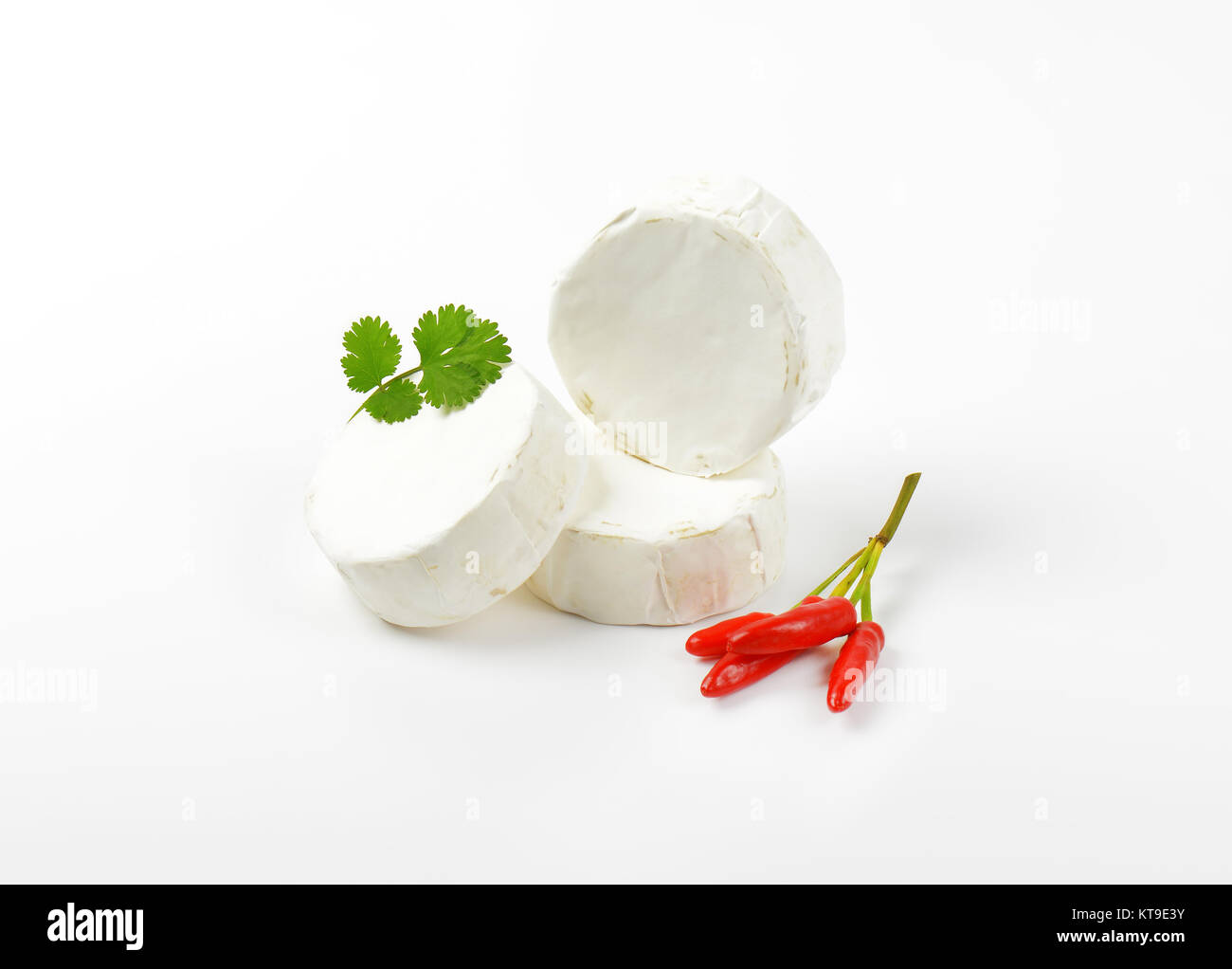 Wheels of soft white cheese Stock Photo - Alamy