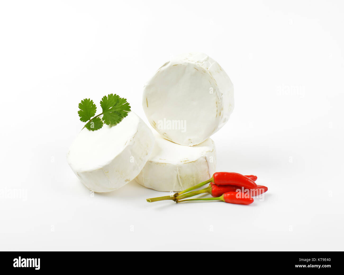 Wheels of soft white cheese Stock Photo - Alamy